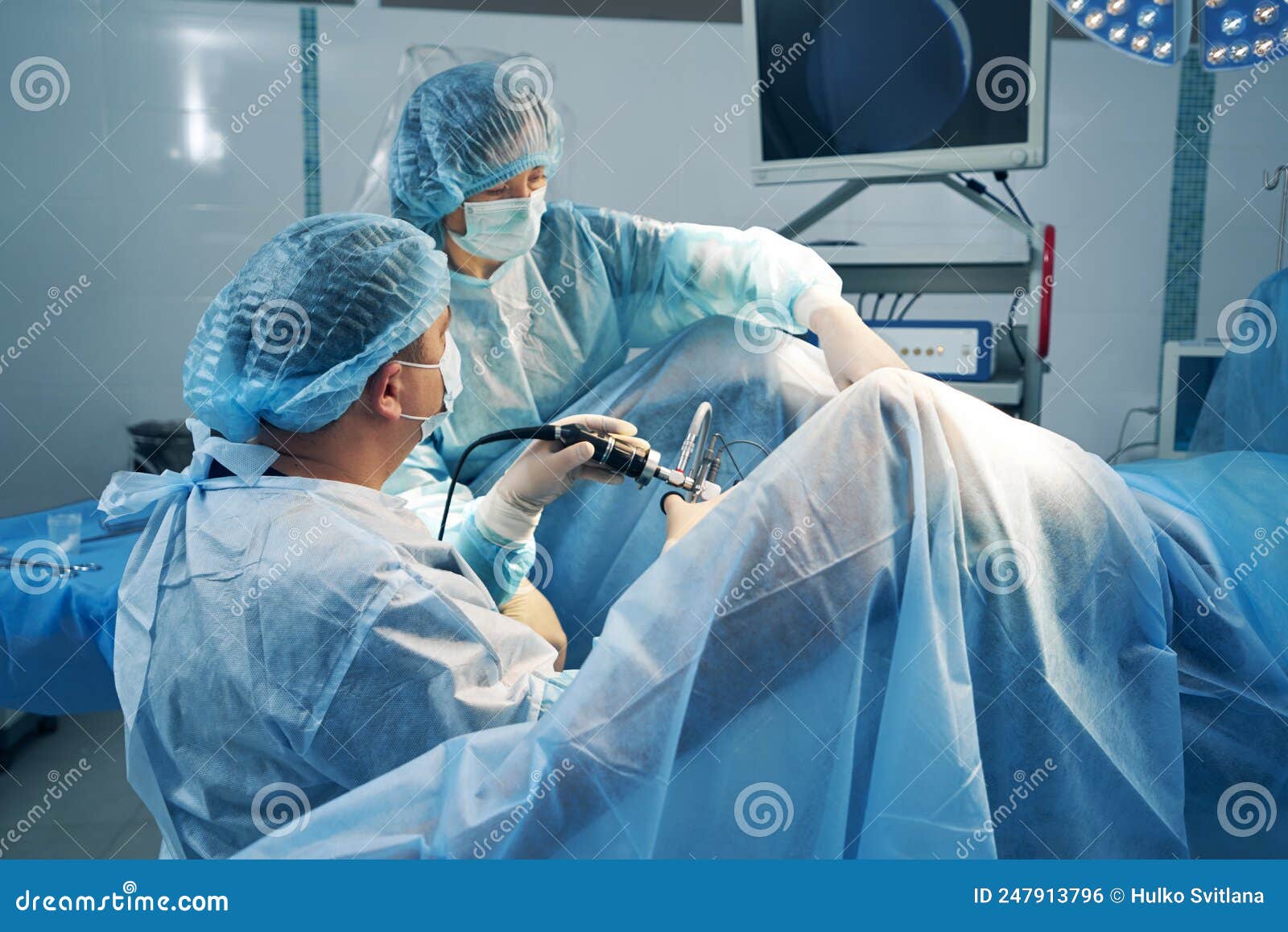Surgeons Using Laparoscope during Operation in Pelvic Area Stock Photo ...