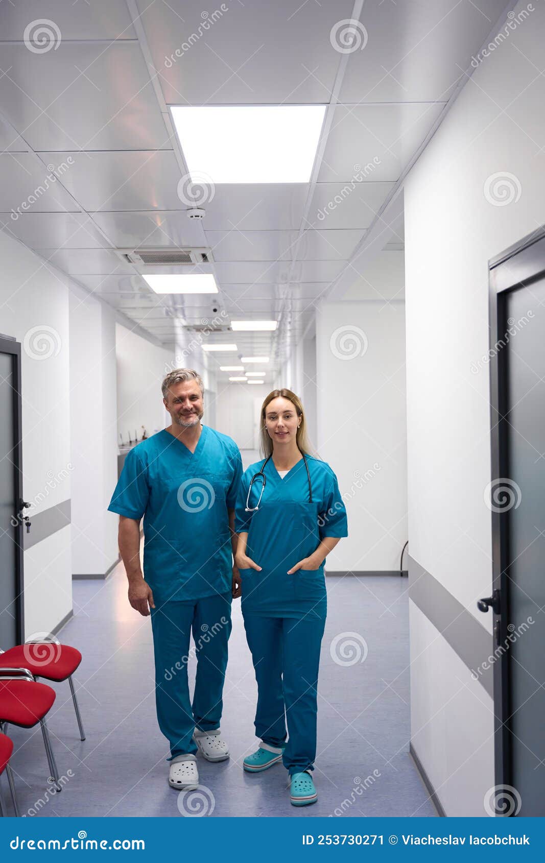 Two Doctors Smiling Looking at the Camera Stock Image - Image of doctor ...