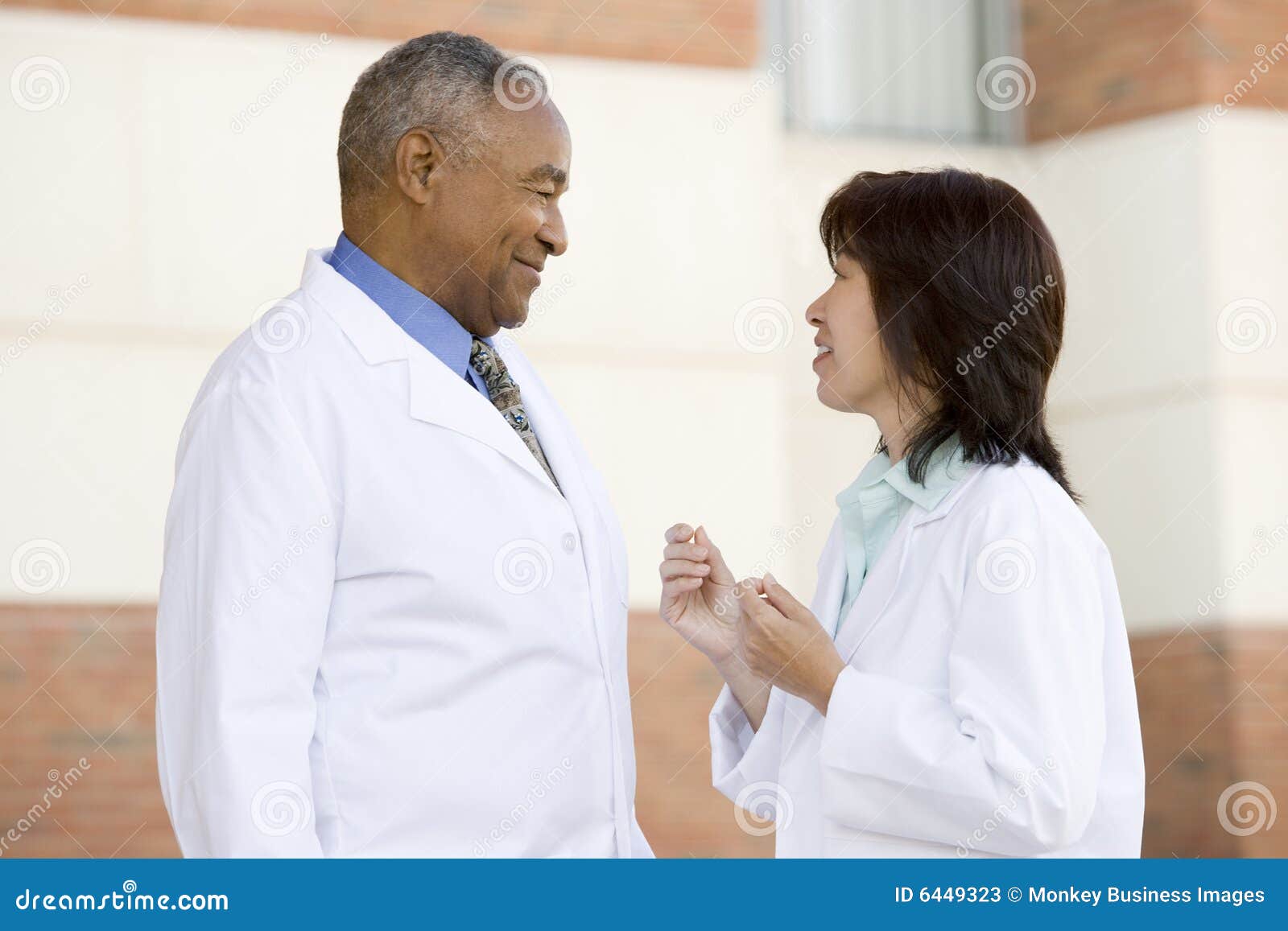 Two Doctors Standing Outside a Hospital Stock Image - Image of ...