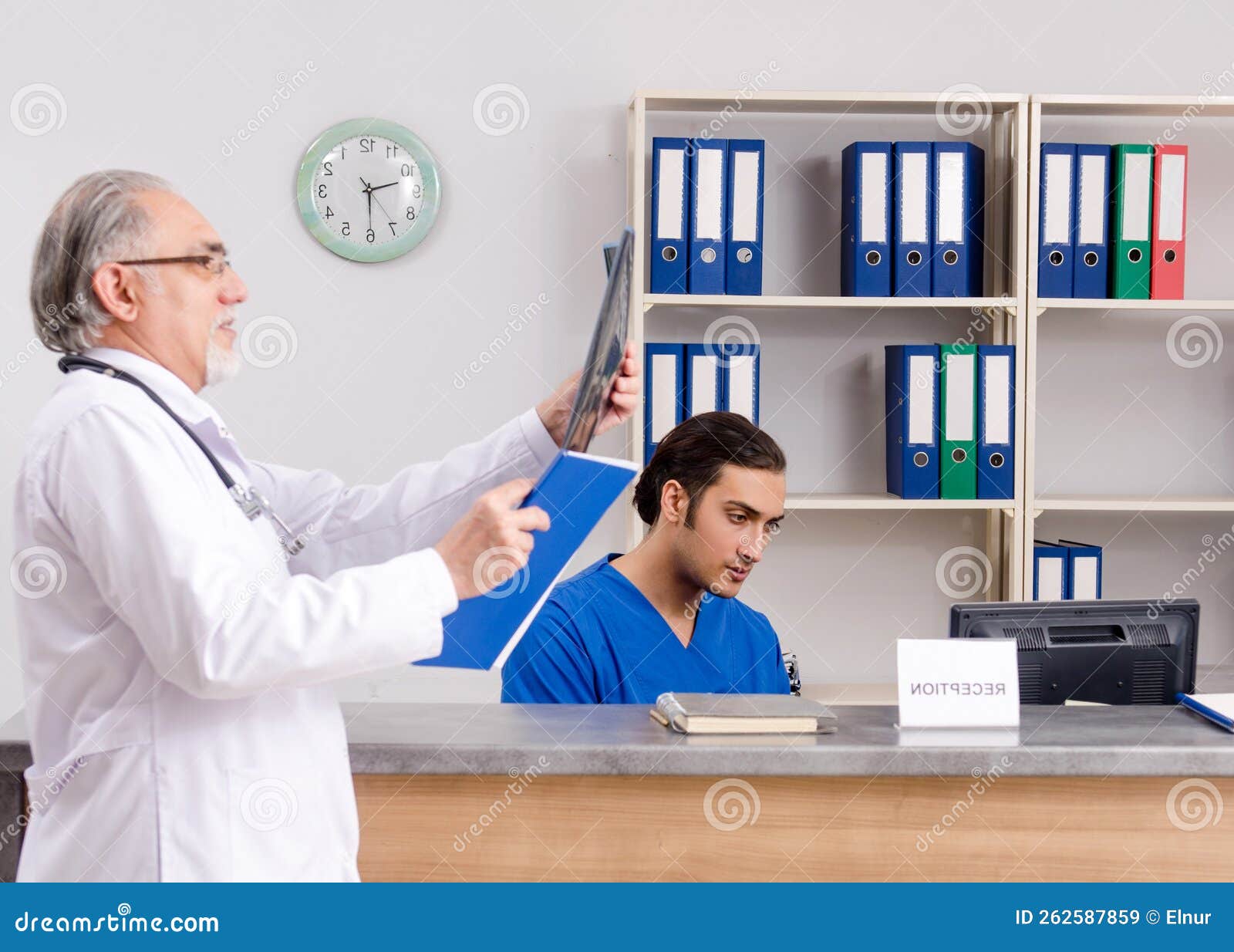 Two Doctors Talking at the Reception in Hospital Stock Image - Image of ...