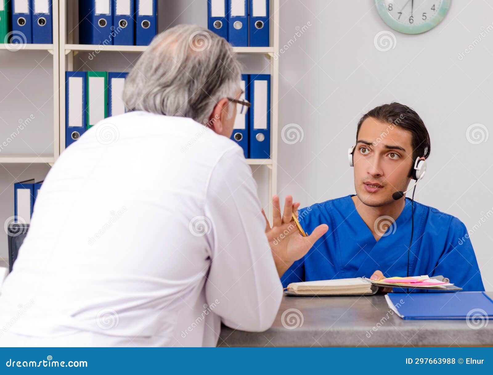 Two Doctors Talking at the Reception in Hospital Stock Photo - Image of ...