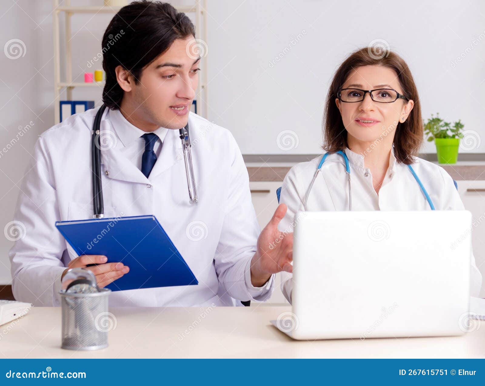 Two Doctors Working in the Clinic Stock Image - Image of medicine ...