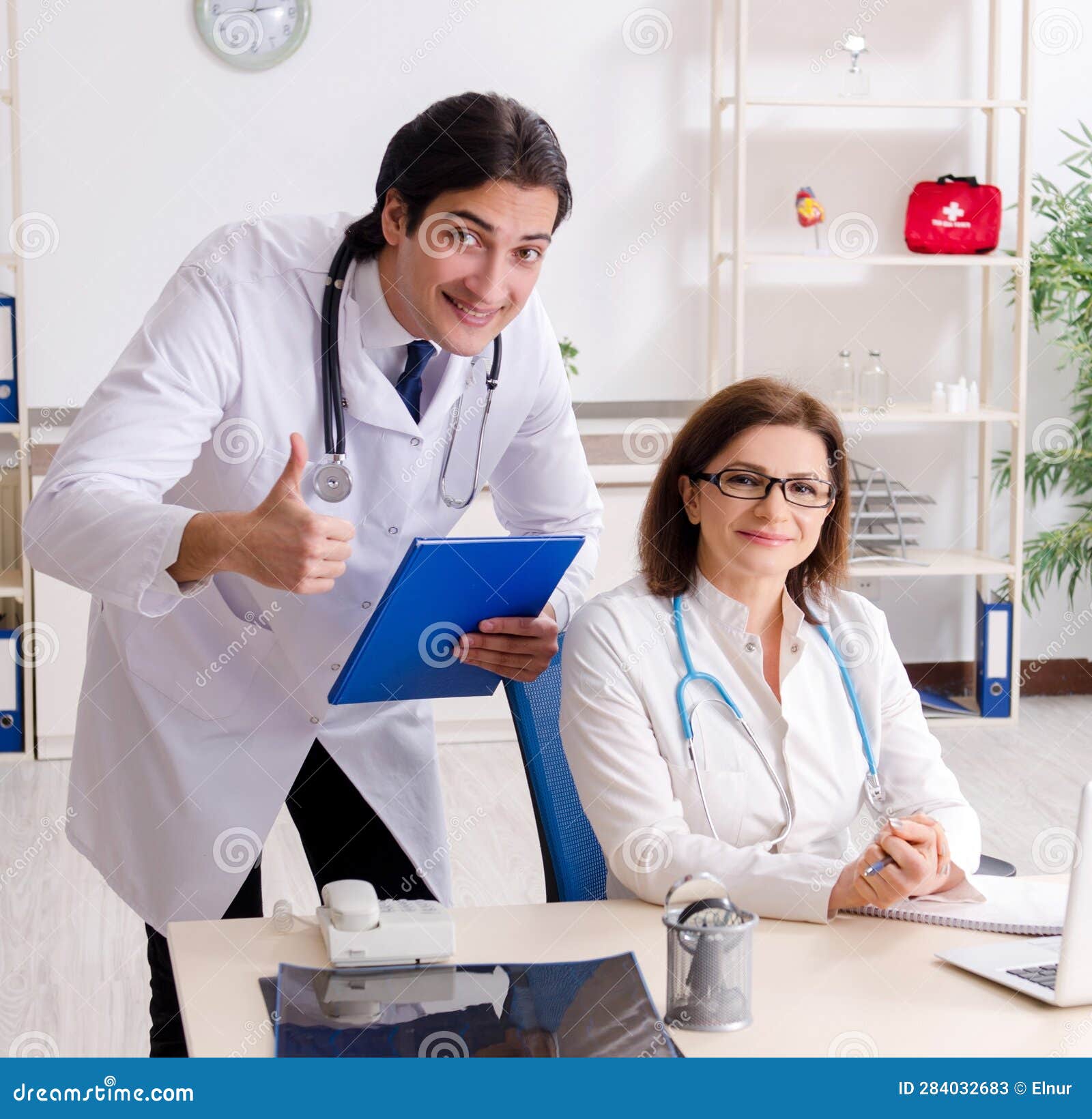 Two Doctors Working in the Clinic Stock Image - Image of case ...