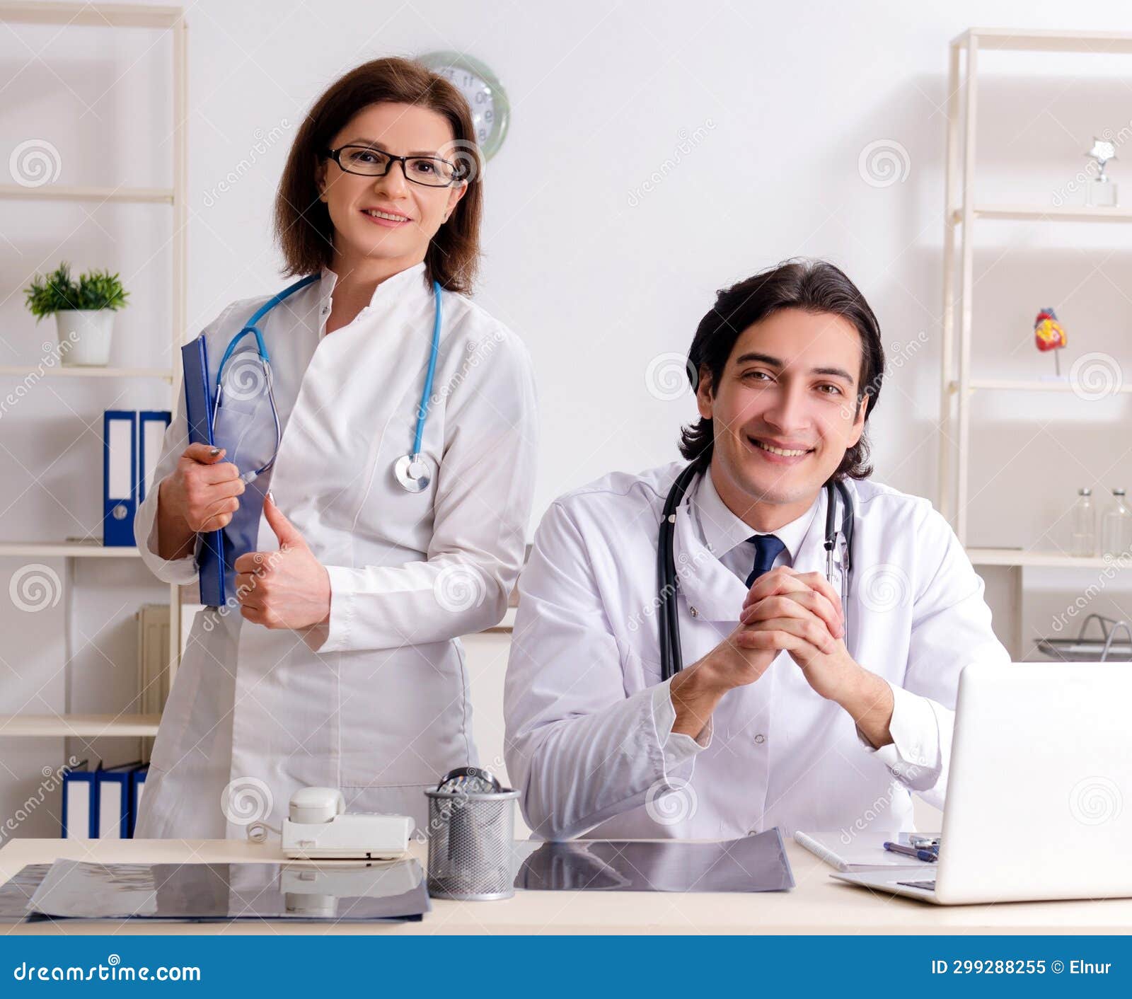 Two Doctors Working in the Clinic Stock Image - Image of medicine ...