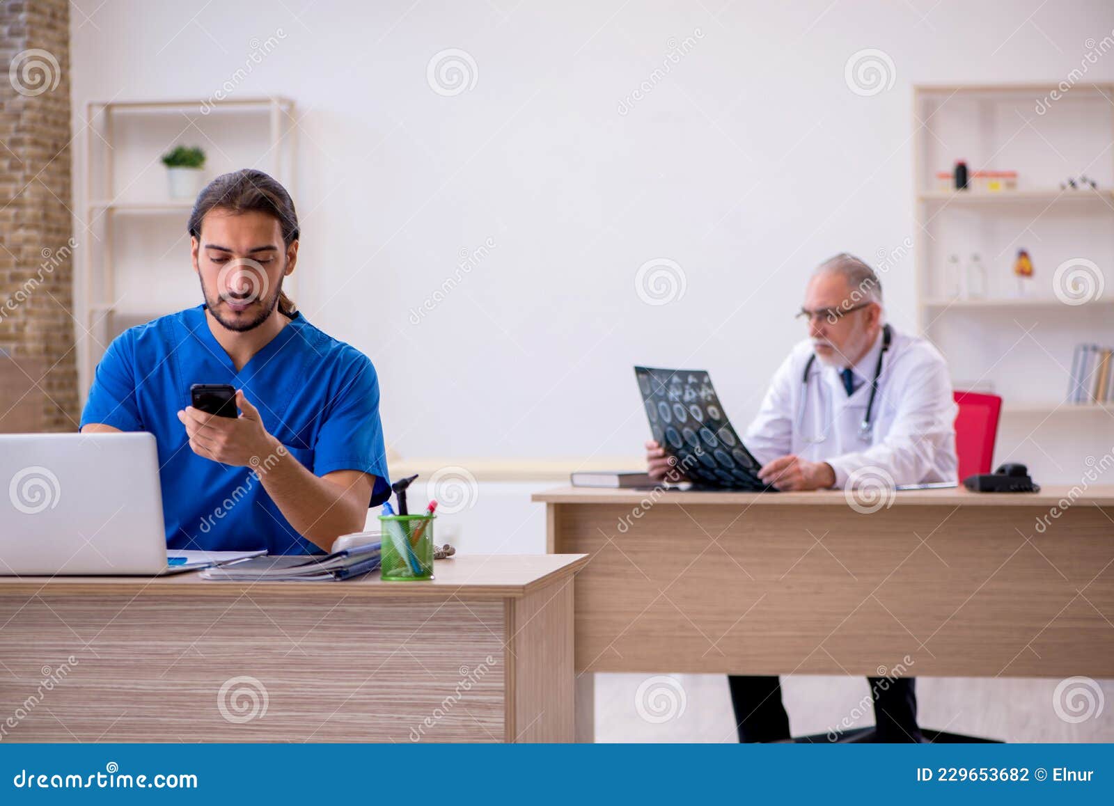 Two Doctors Working in the Clinic Stock Photo - Image of occupation ...
