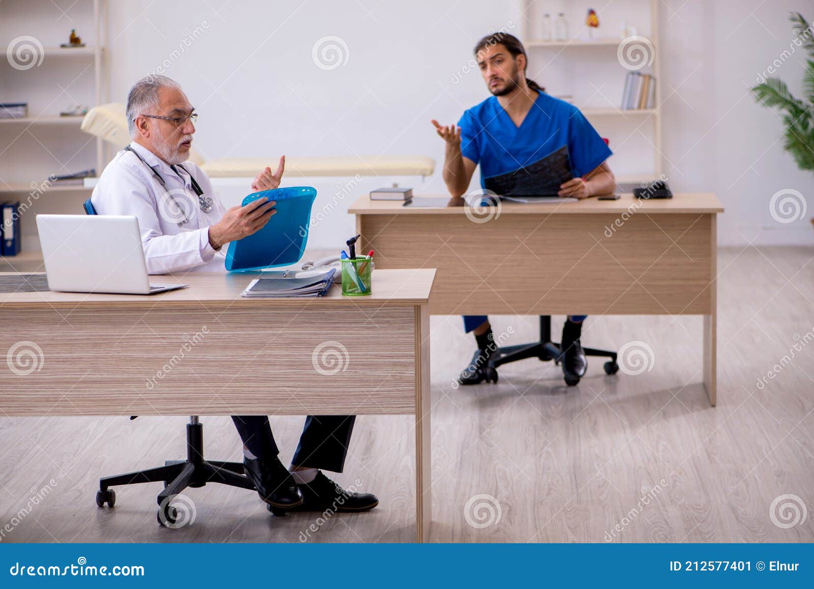Two Doctors Working in the Clinic Stock Image - Image of medical ...