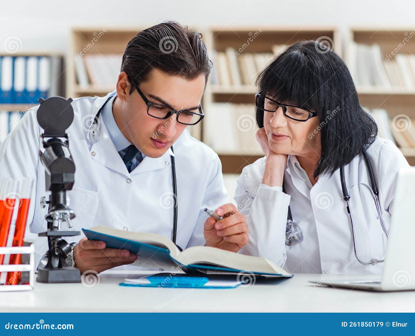Two Doctors Working in the Lab Stock Image - Image of glass, intern ...