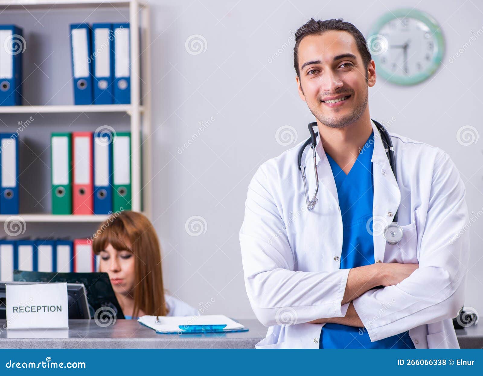 Two Doctors Working at the Reception in the Hospital Stock Photo ...