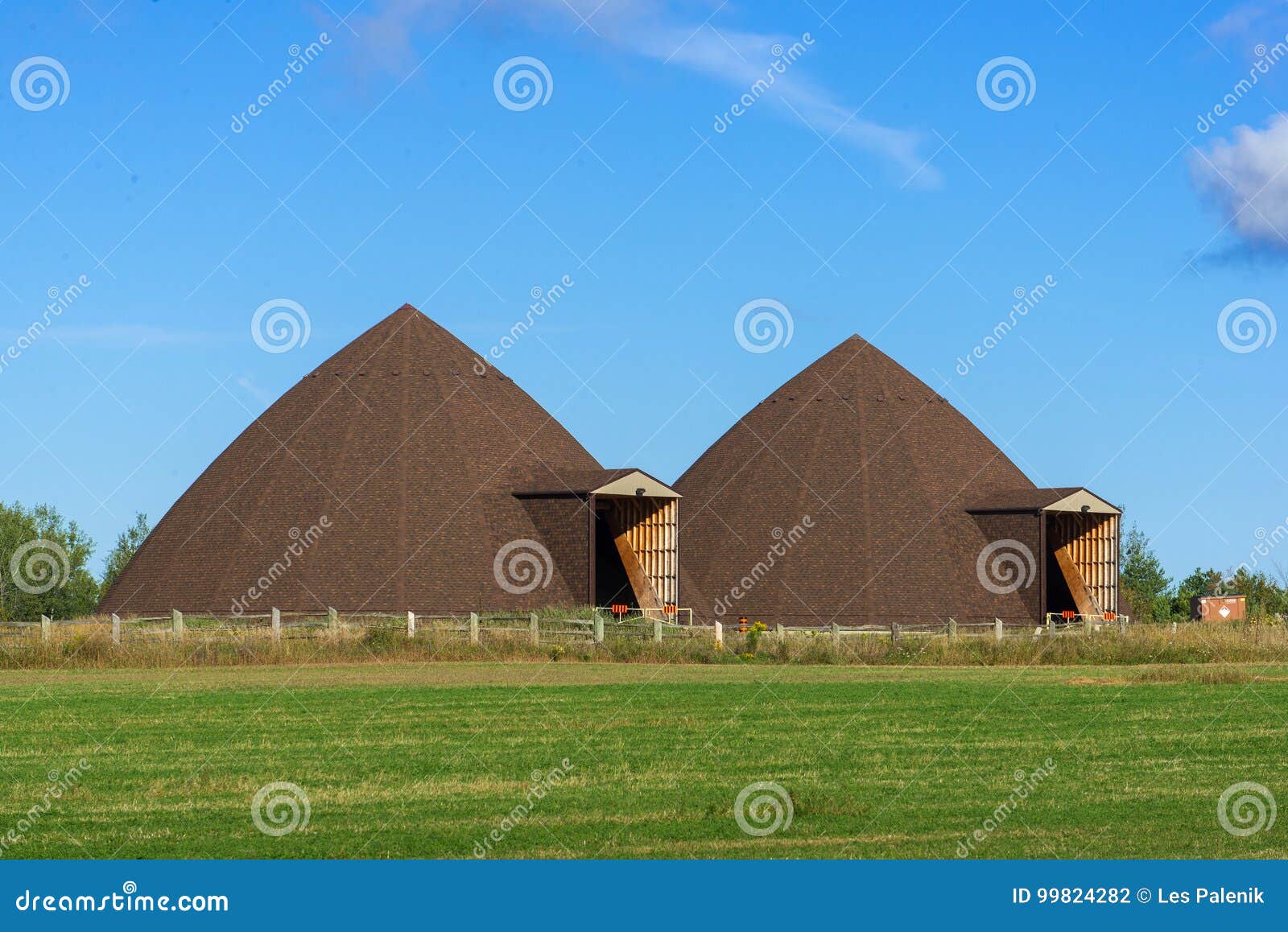 Two dome storage buildings stock photo. Image of countryside - 99824282
