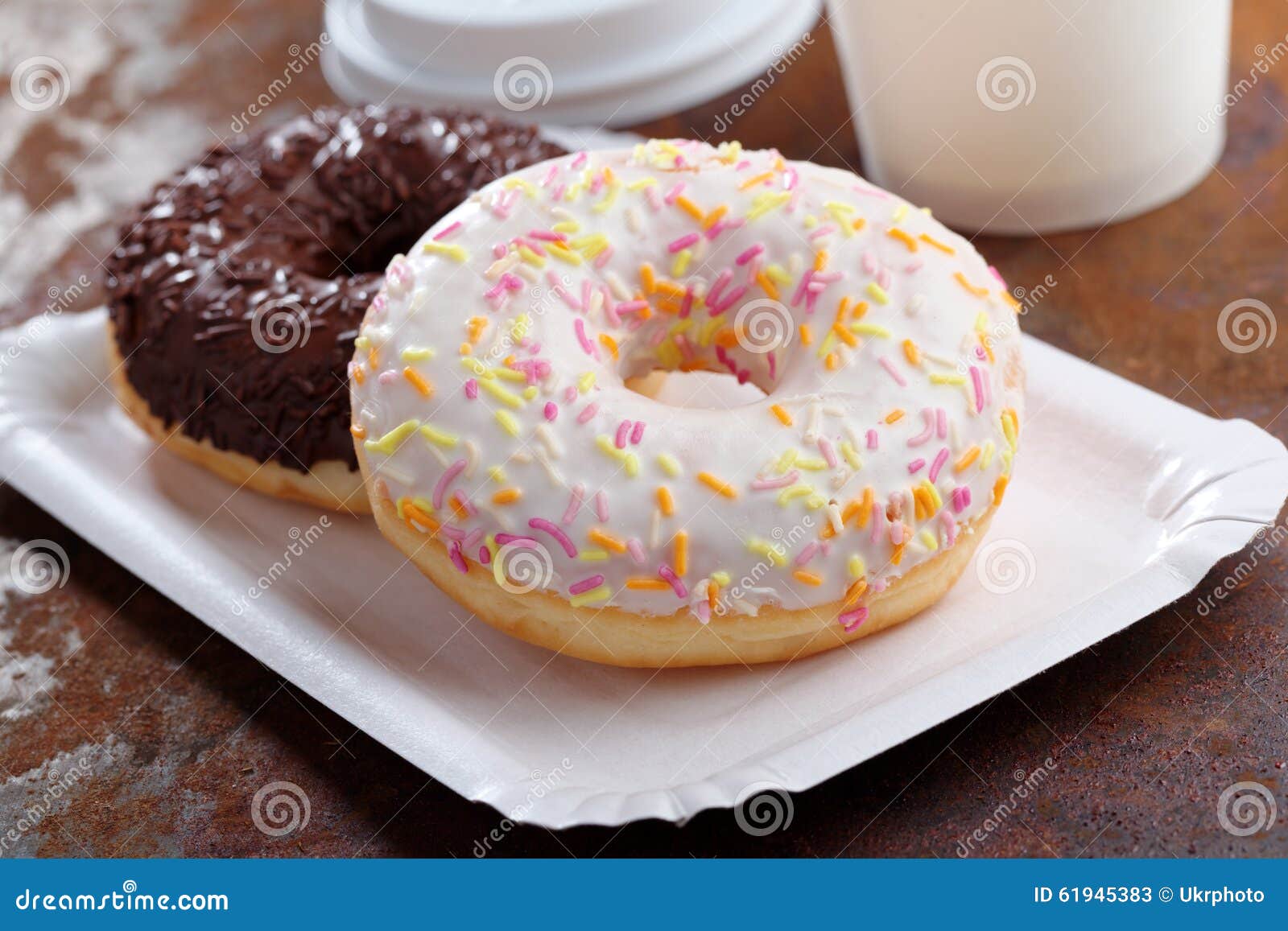 Two donuts on a paper tray stock image. Image of topping - 61945383