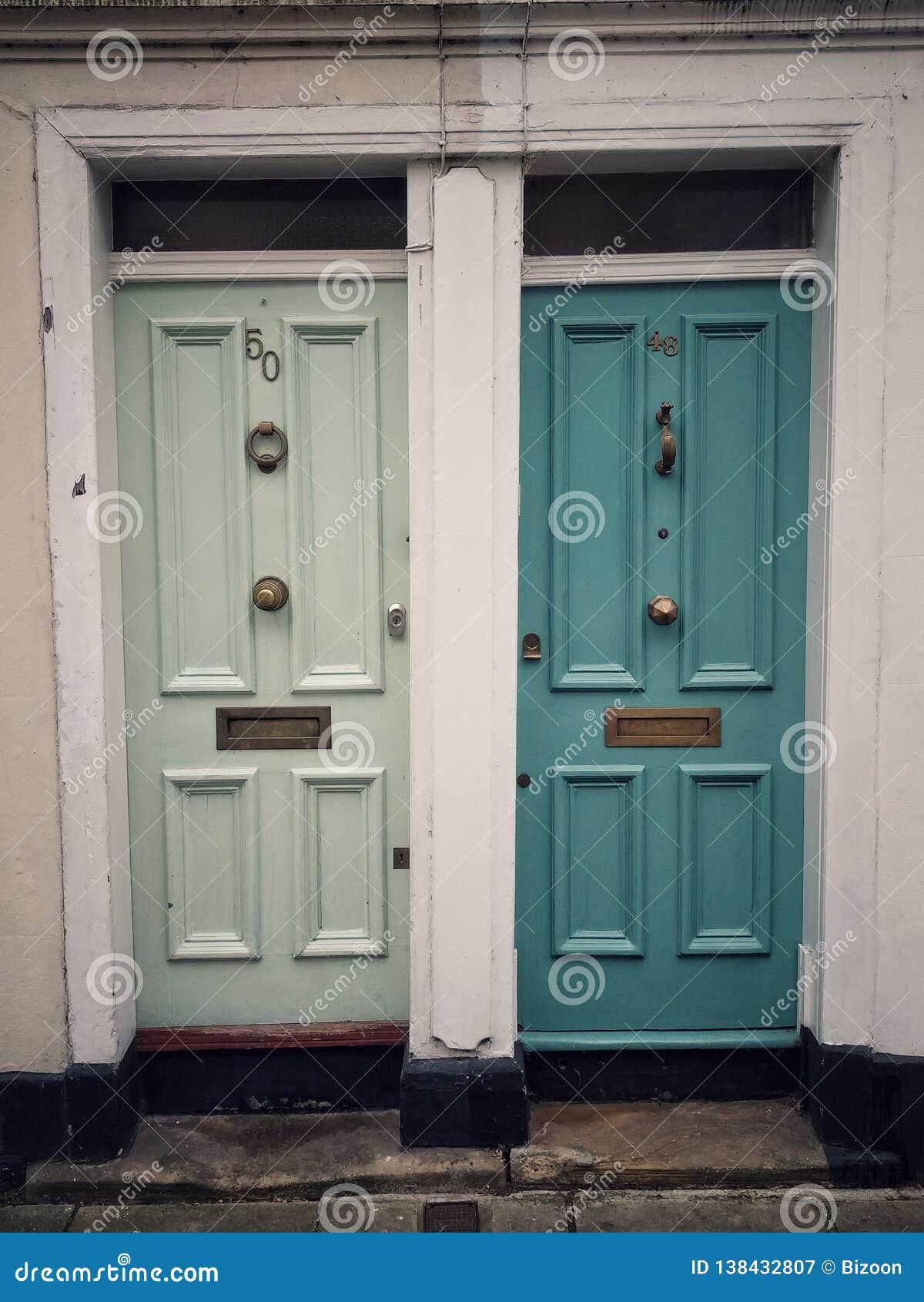 Two Doors on a Building Facade Stock Image - Image of facade, antique ...