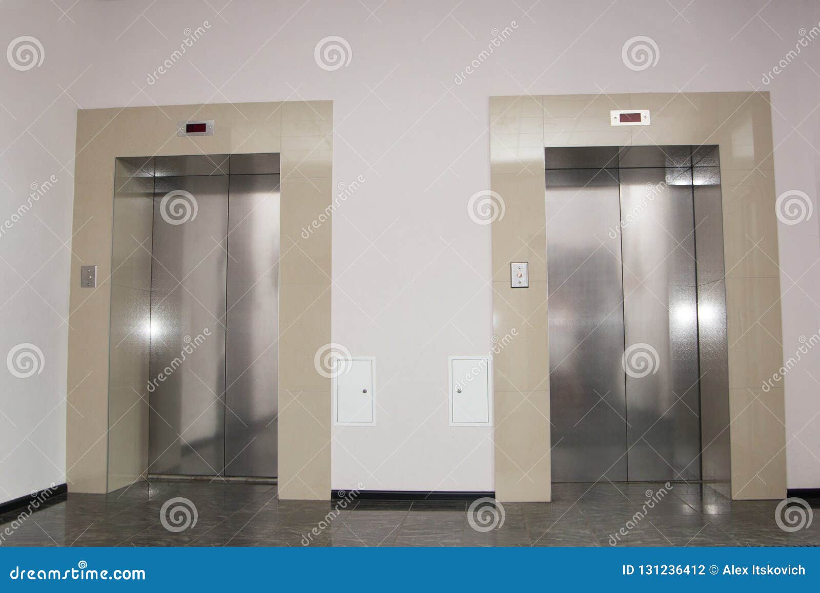 Two Doors of Elevators in Modern Business Building. Stock Photo - Image ...