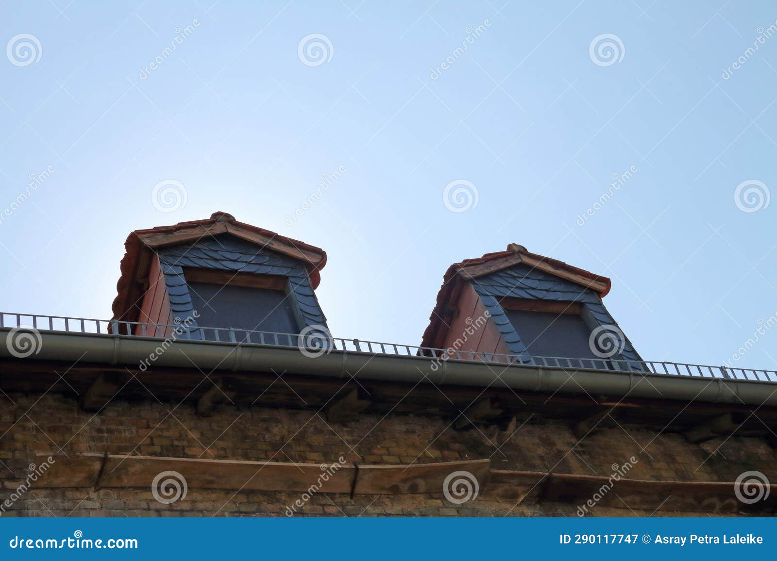 Two Dormer Windows on an Old, Decaying Brick Building Stock Image ...
