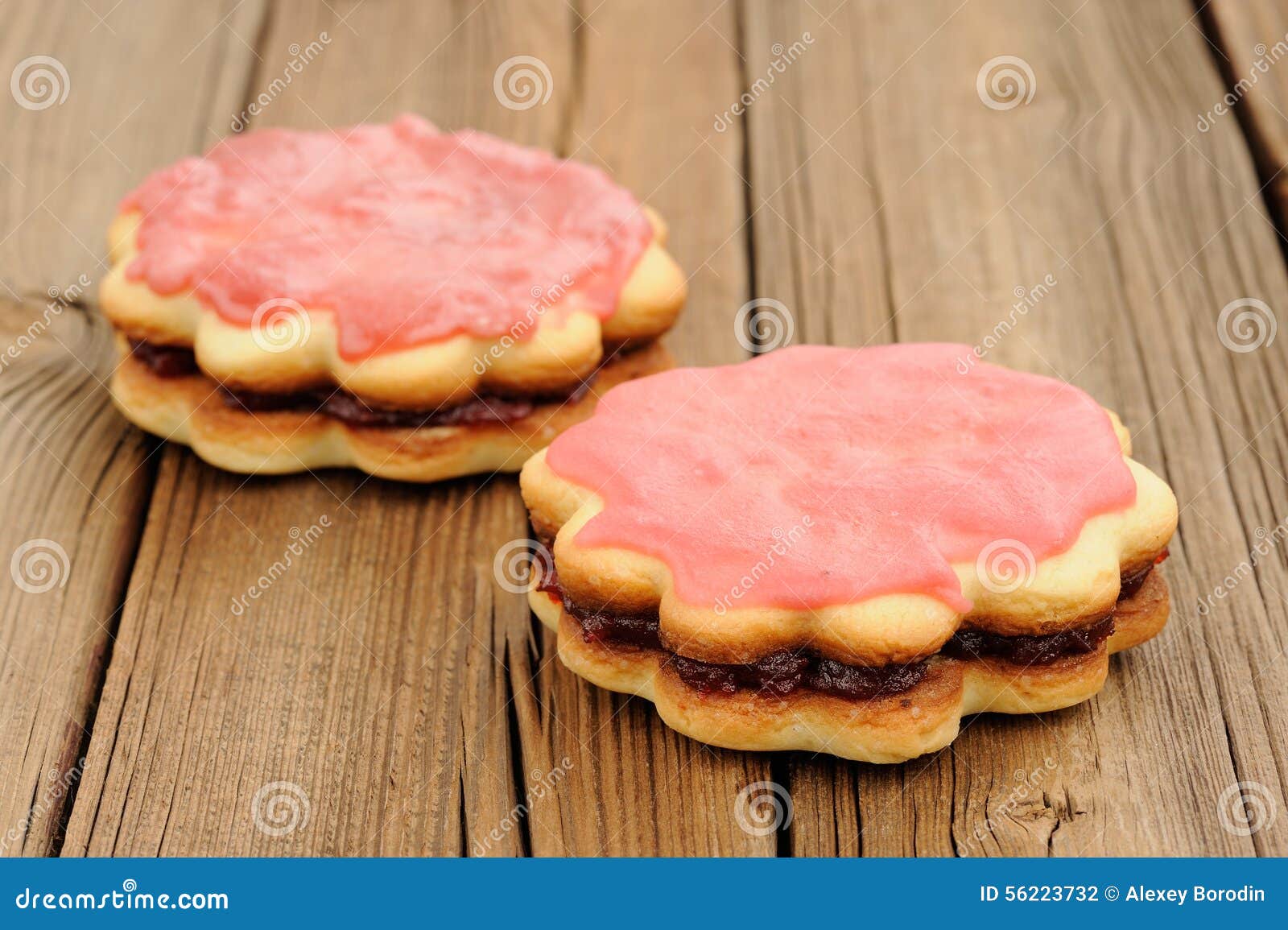 Two Double Round Sand Cakes Decorated with Pink Icing and Jam on Stock ...