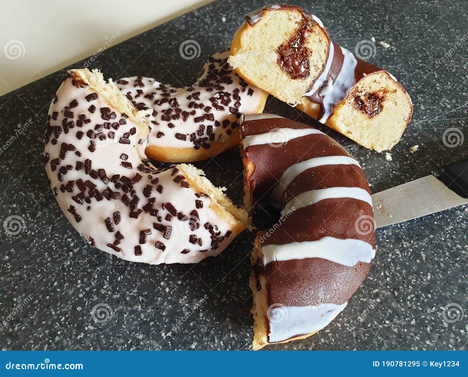 Two doughnuts cut in half stock image. Image of diet - 190781295