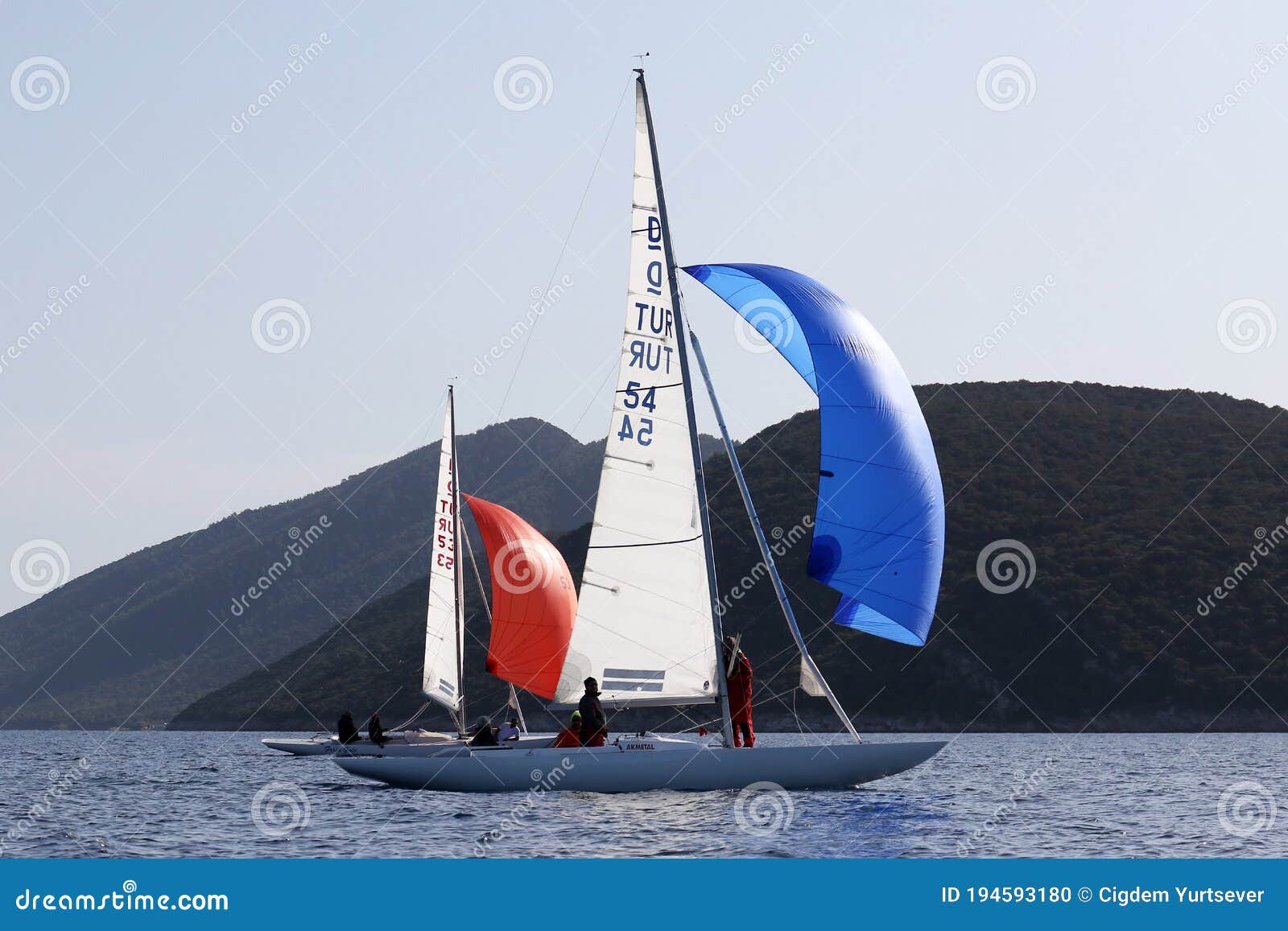 Two Dragon Boats with Colored Spinnaker Sailing and Competing for ...