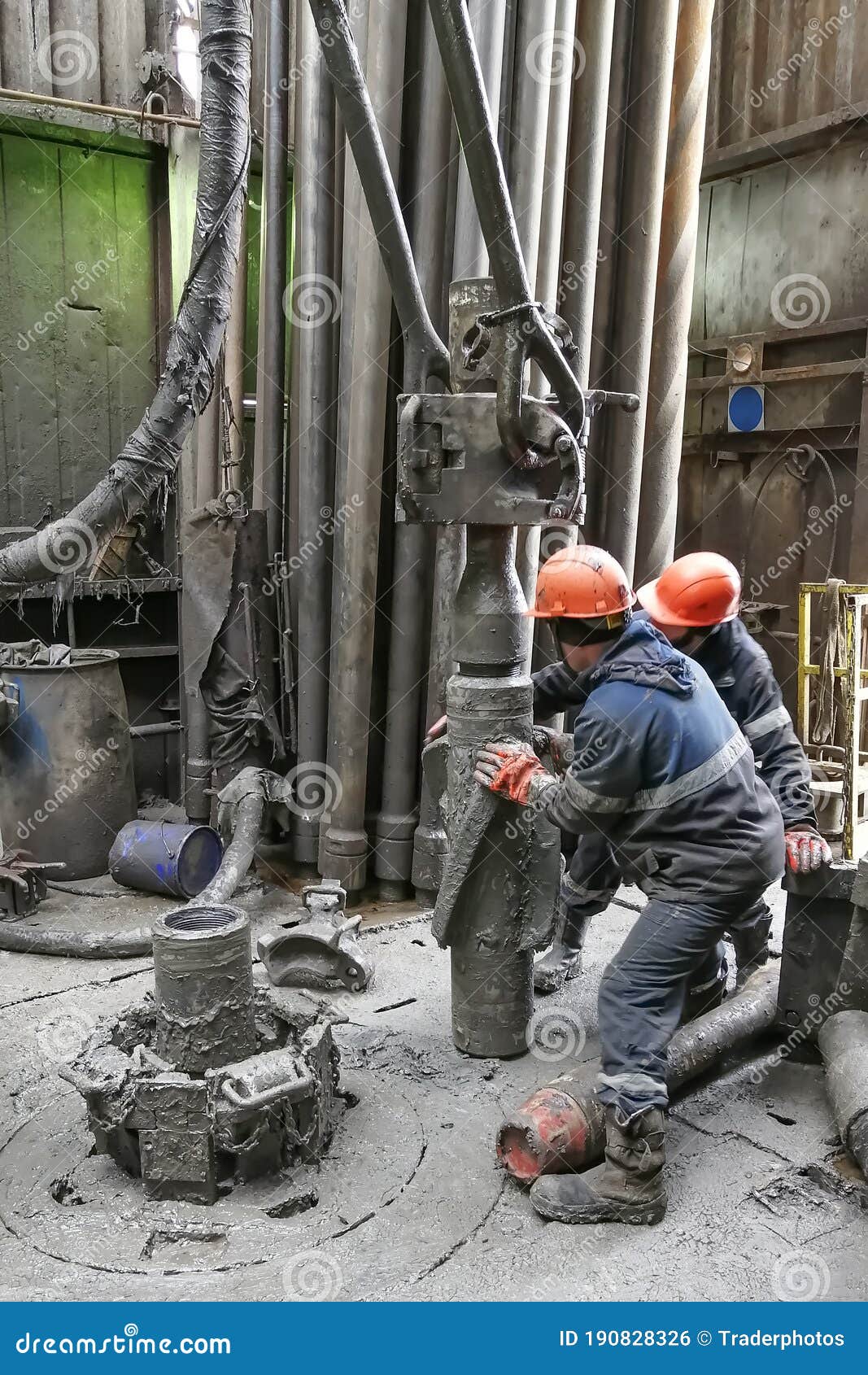 Drilling Workers are Busy Working with the Casing. Editorial Photo ...