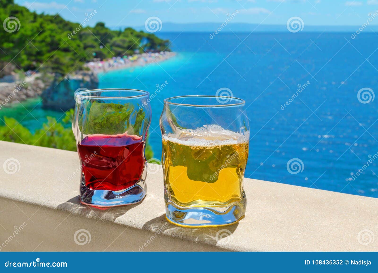 Two Drinks With View Of Beach Punta Rata In Croatia, Brela Stock ...