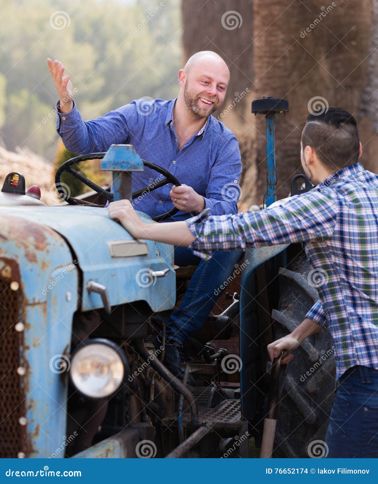 Two Drivers Working with Tractor Stock Photo - Image of outdoor ...