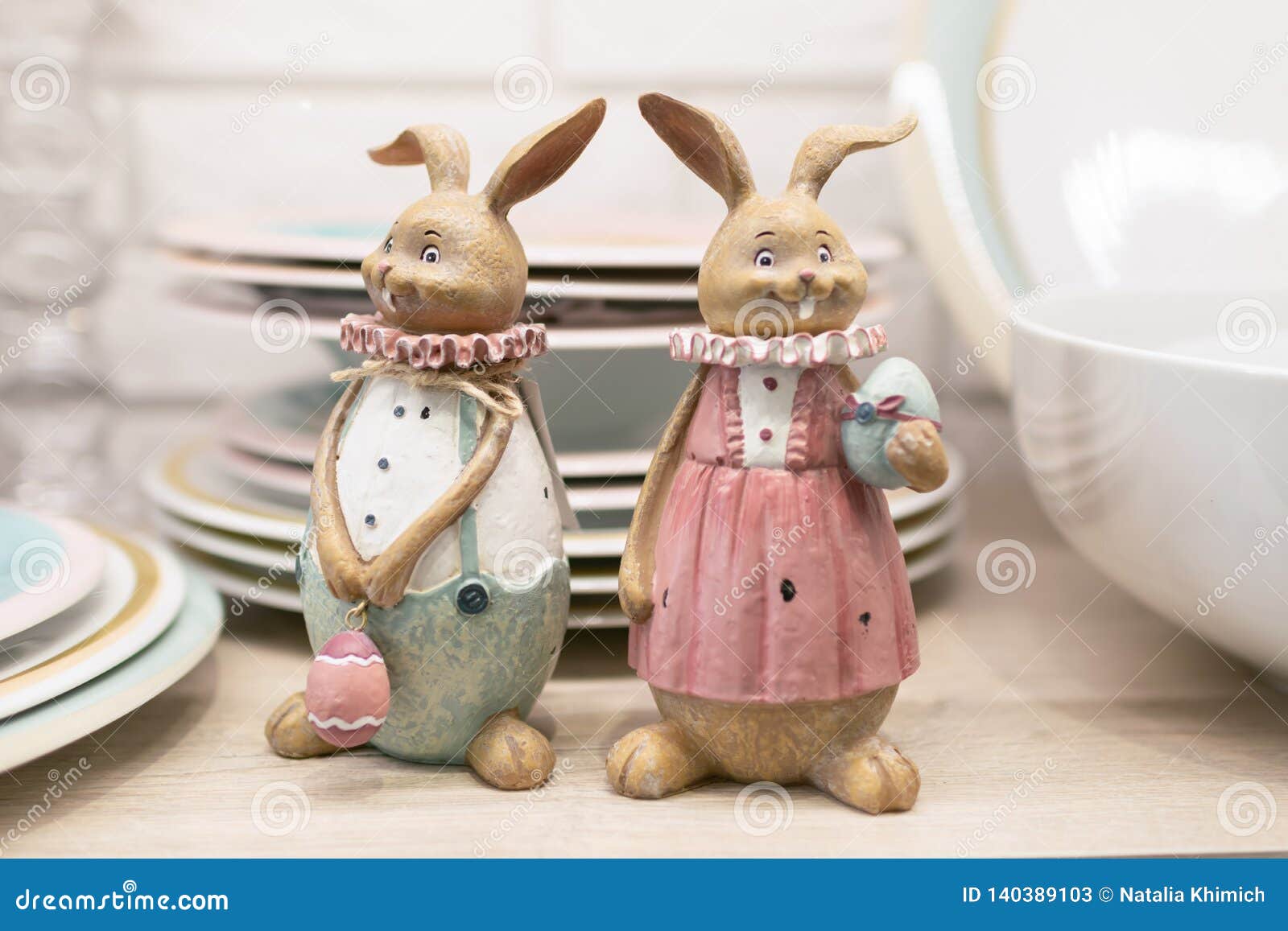Two Easter Pottery Hare on a Kitchen Table Shelf. Ceramic Figurines for ...