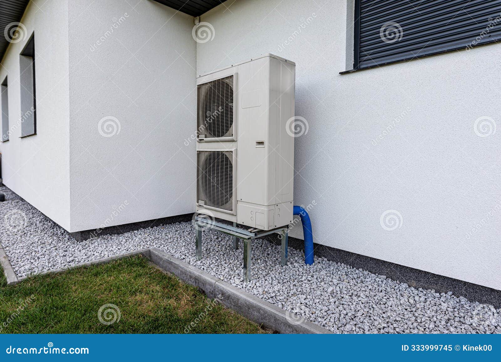 Two Efficient Outdoor Heat Pump Units Placed in Front of the House ...