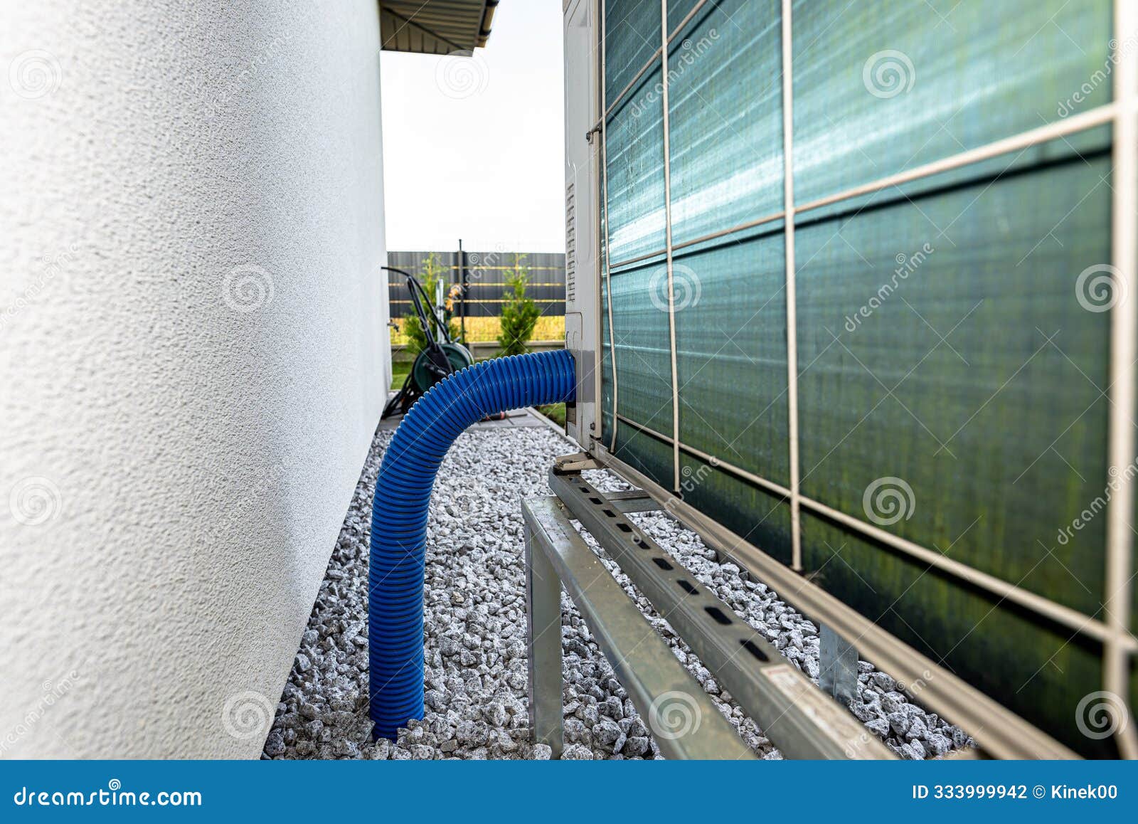 Two Efficient Outdoor Heat Pump Units Placed in Front of the House ...