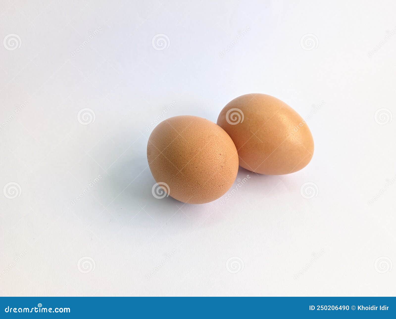 Two Eggs on a White Background Stock Photo - Image of easter, brown ...