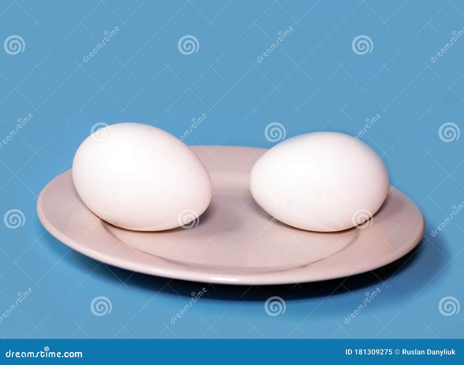 Two eggs in white plate stock image. Image of chicken - 181309275