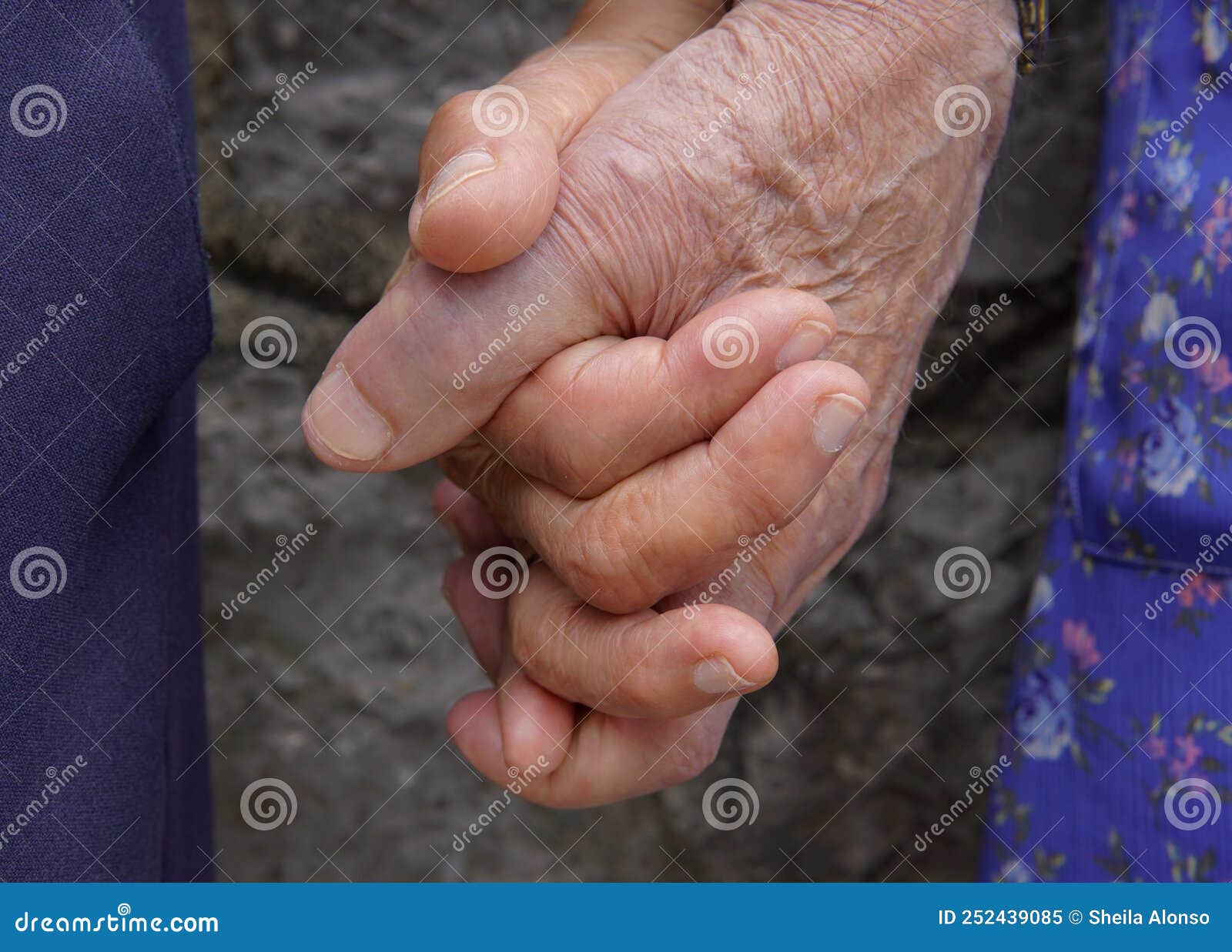 Two Elderly People Shaking Hands. Foreground Stock Image - Image of ...