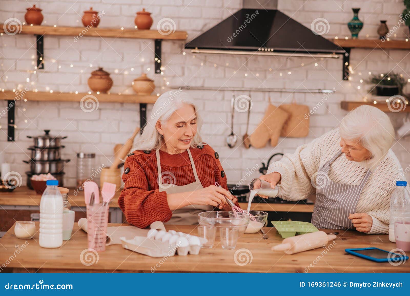 Two Elderly Women Looking Busy in the Kitchen Stock Photo - Image of ...