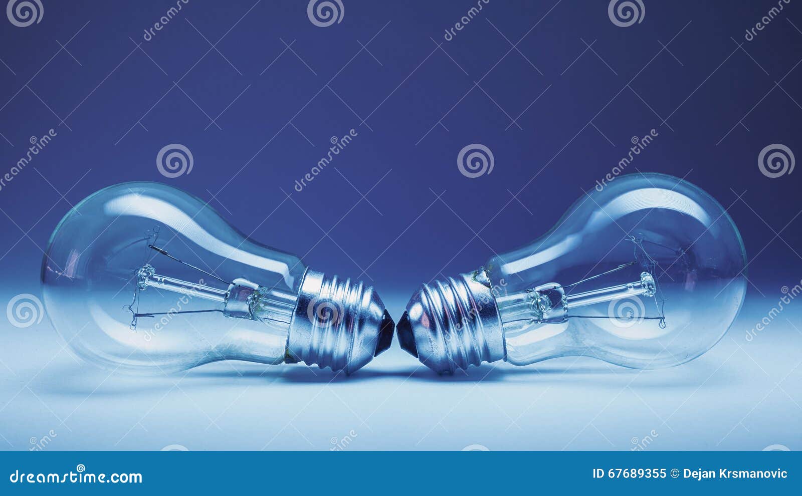 Two Electric Bulbs in Blue stock image. Image of lifestyle - 67689355