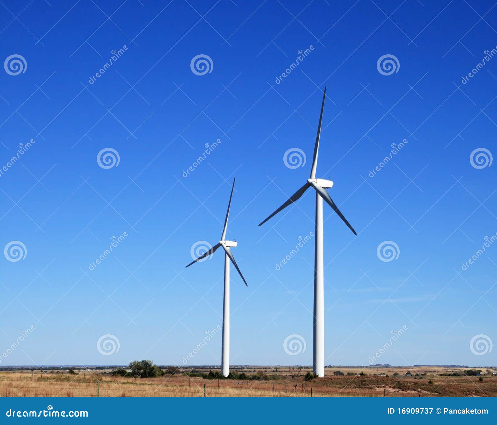 Two electric windmills stock image. Image of flat, blue - 16909737