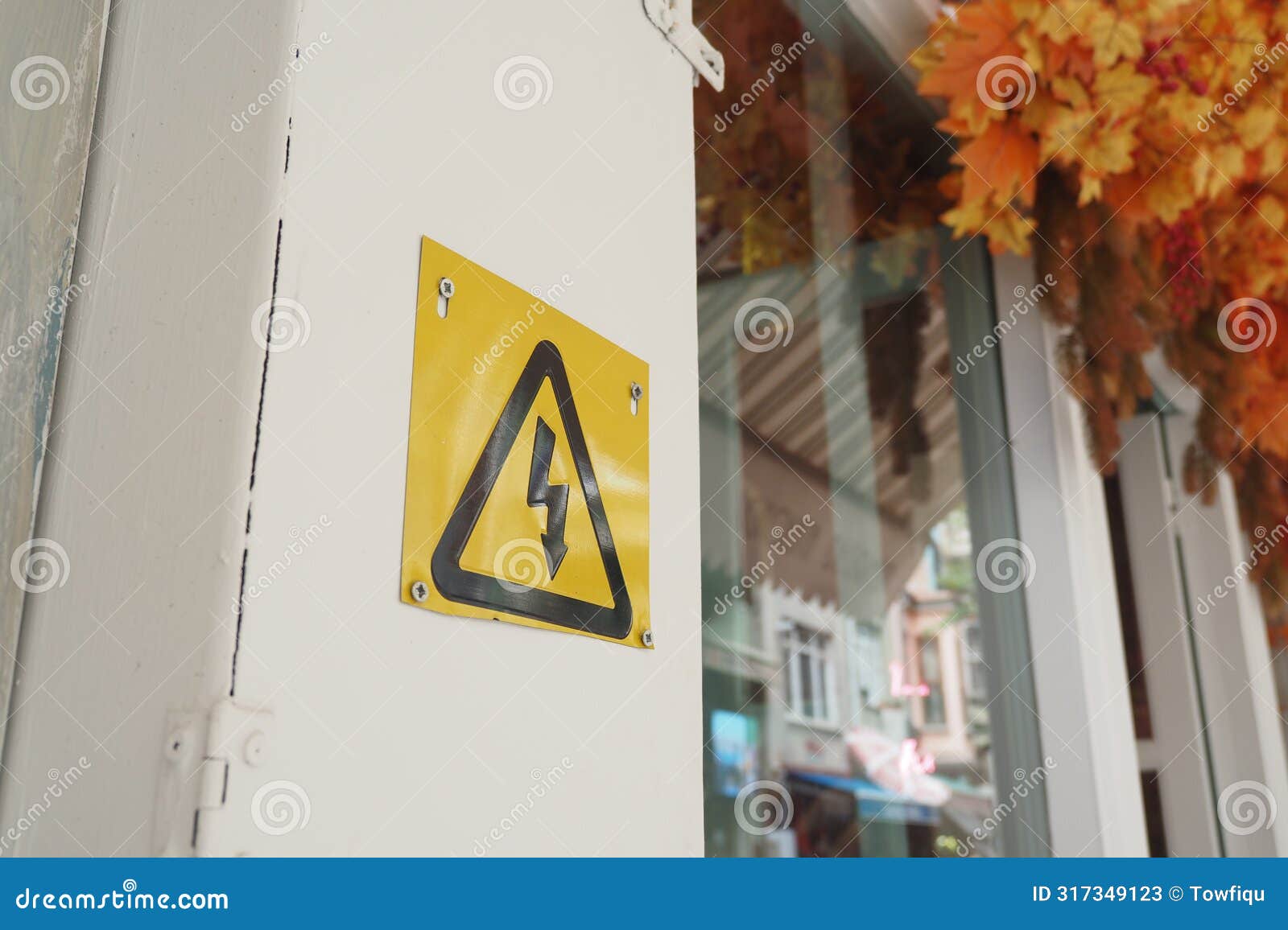 Two Electrical Boxes with Lightning Bolt on Brick Wall Stock Image ...