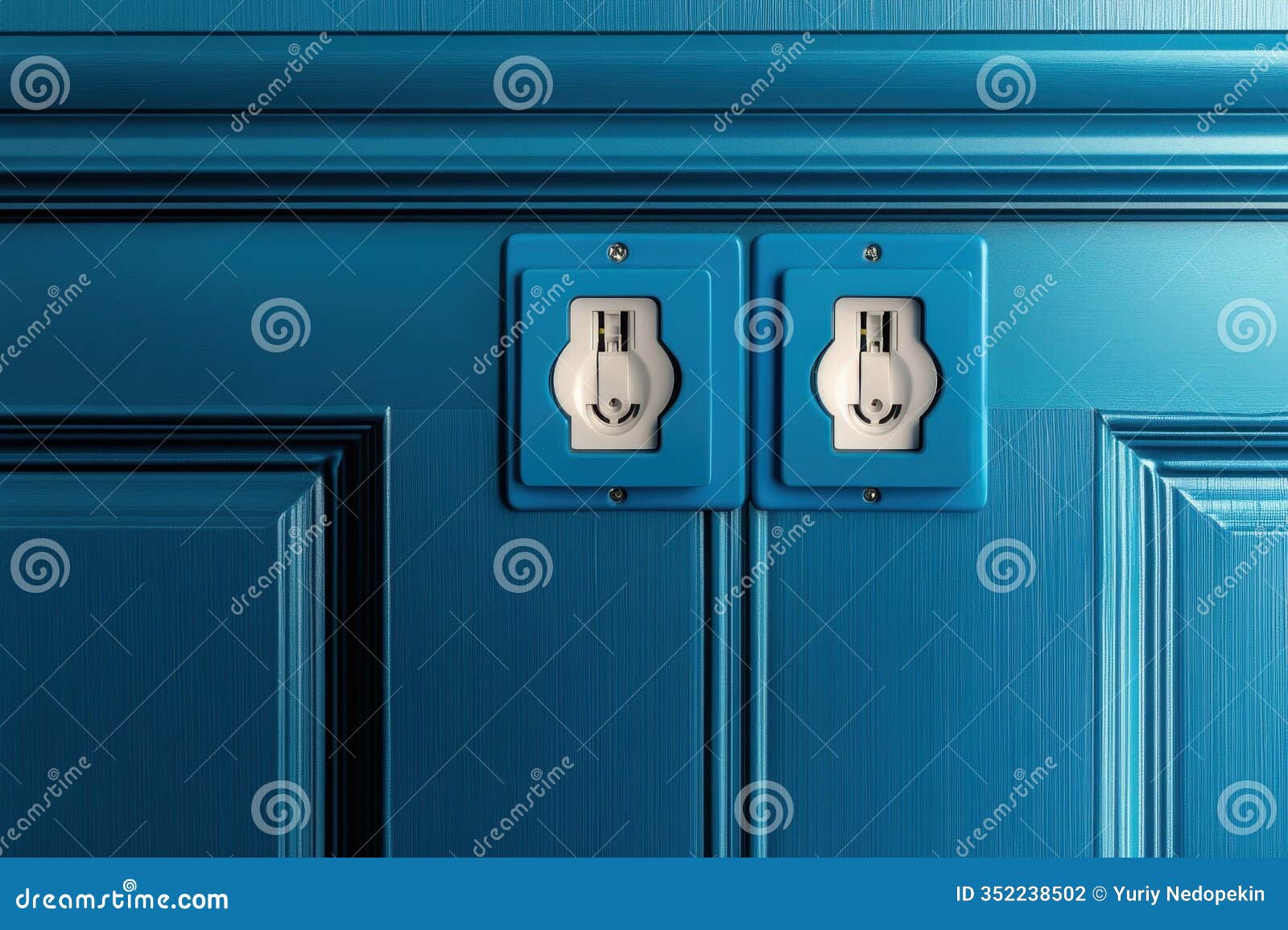 Two Electrical Outlets on a Vibrant Blue Wall in a Modern Interior ...