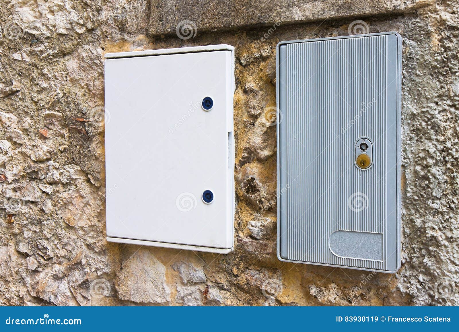 Two Electrical Plastic Junction Box Against A Stone And Brick Wa Stock ...