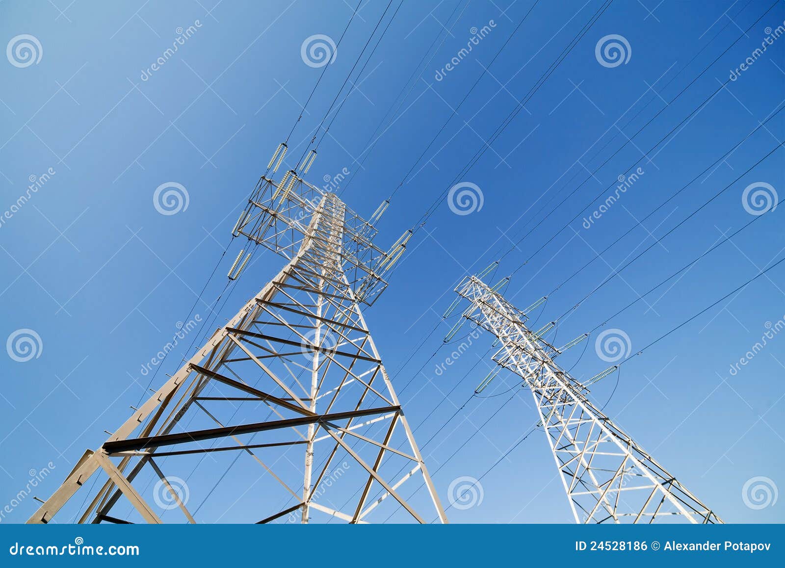 Two Electrical Pylons on Blue Sky Stock Photo - Image of supply ...