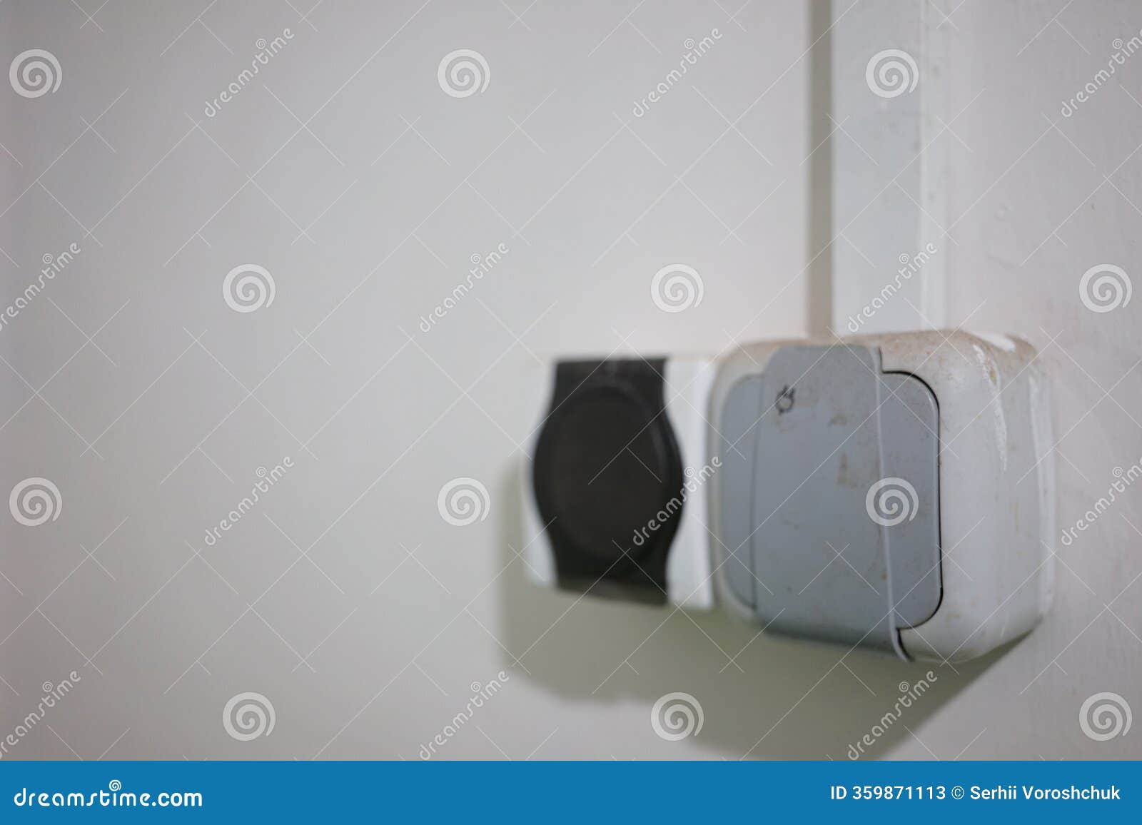 Electrical Switches Mounted on a White Wall in an Indoor Setting Stock ...