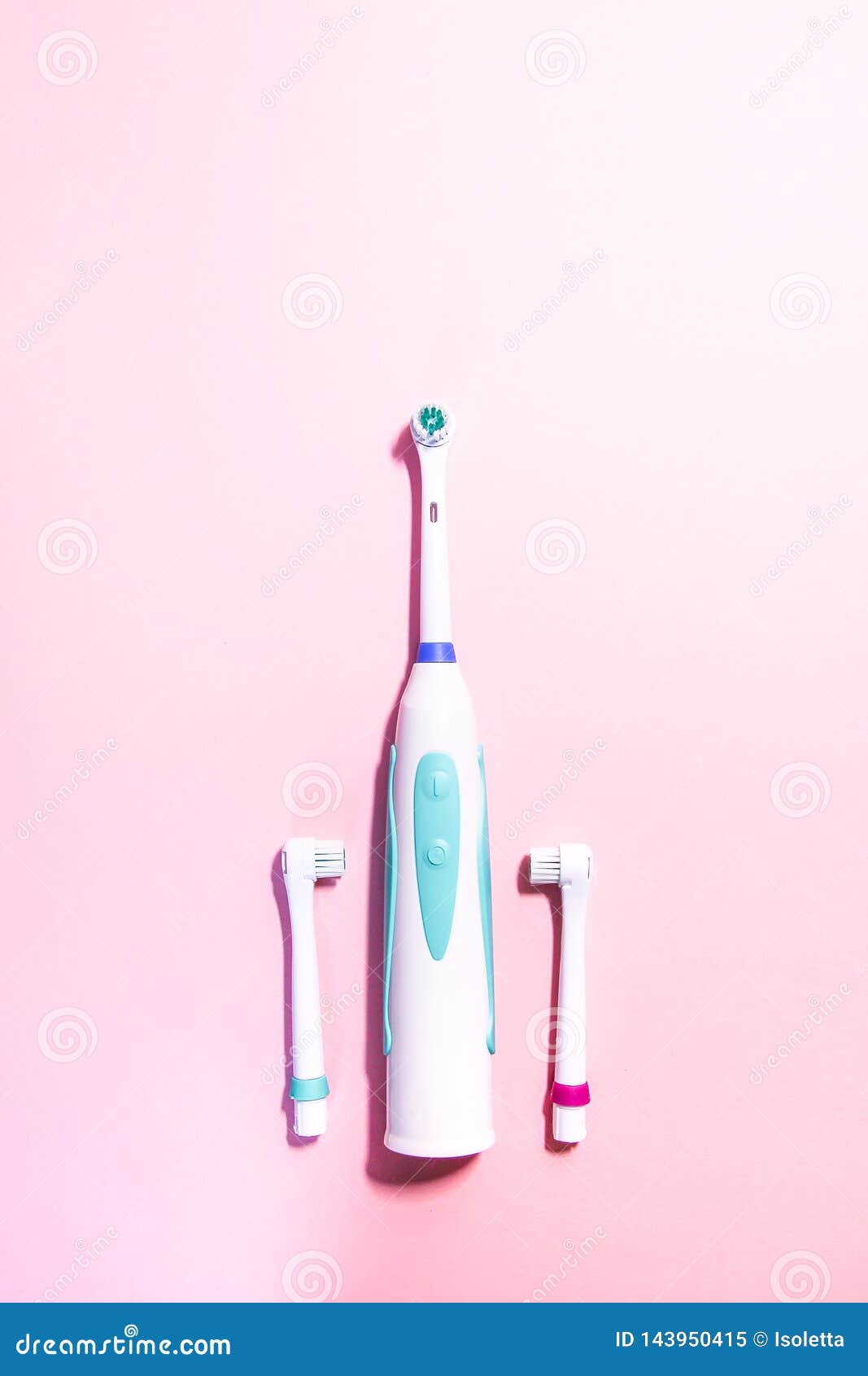 Three Electrical Toothbrushes on a Soft Light Pink Background Stock ...