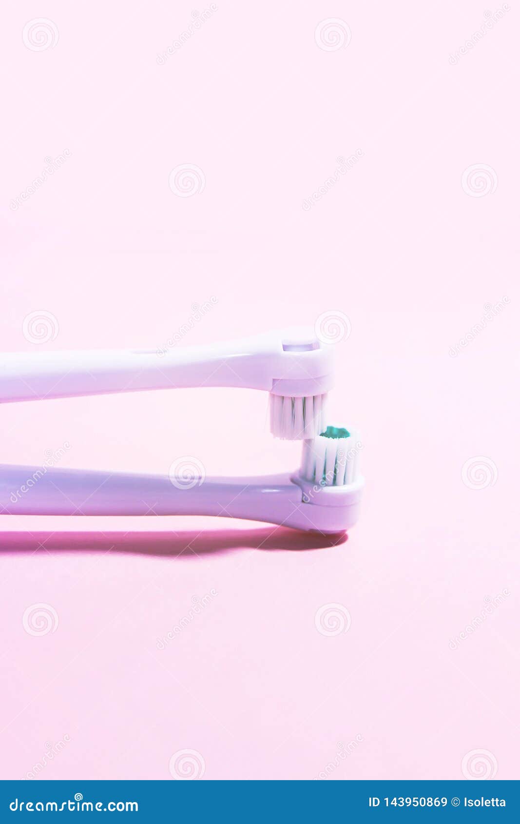 Two Electrical Toothbrushes on a Soft Light Pink Background. Stock ...