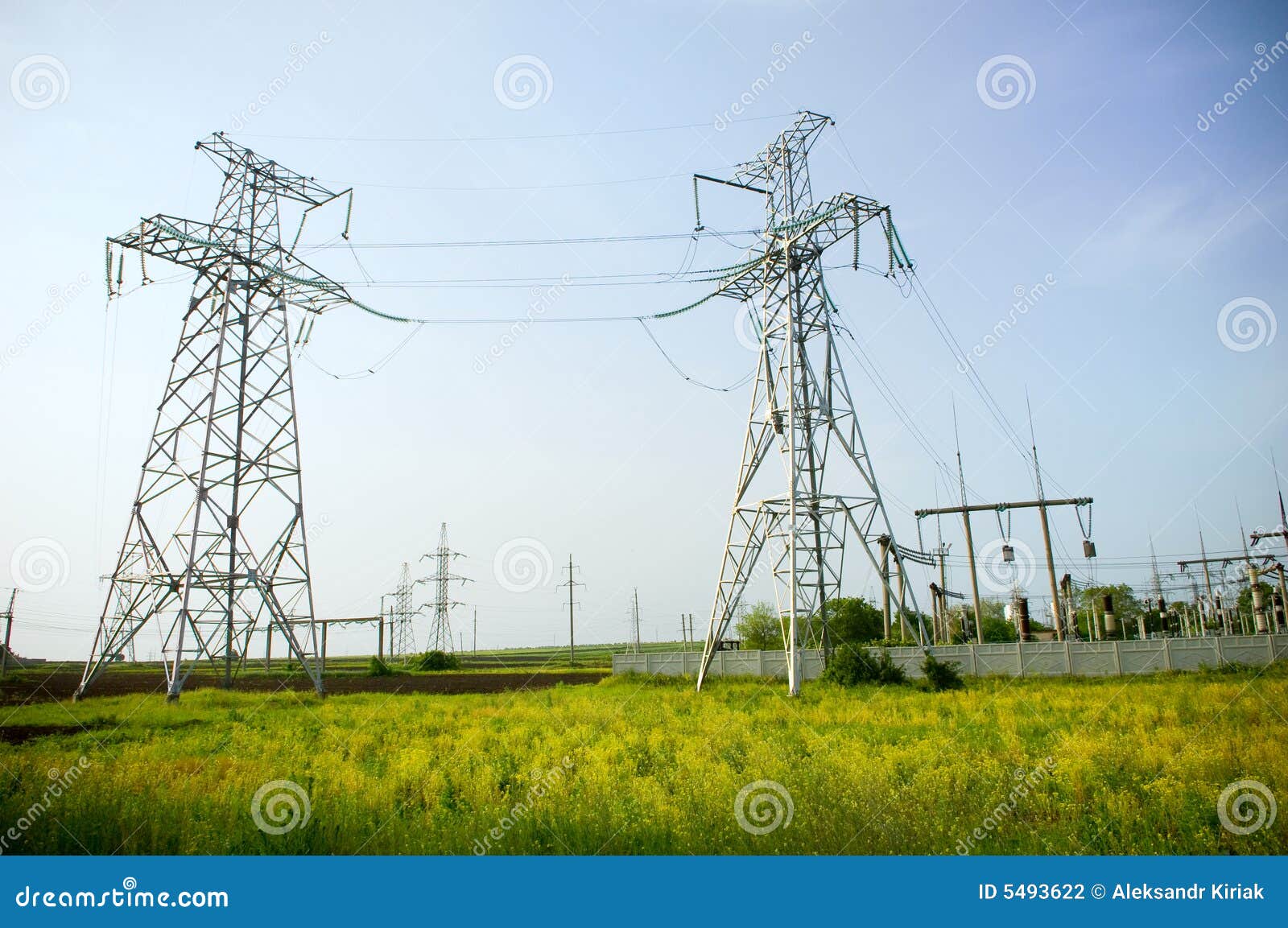 Two Electrical Towers on Blue Sky Background Stock Photo - Image of ...