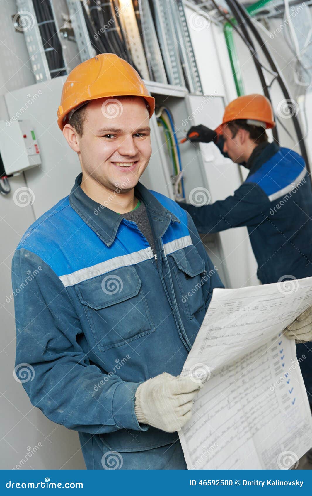 Two electrician workers stock photo. Image of electric - 46592500