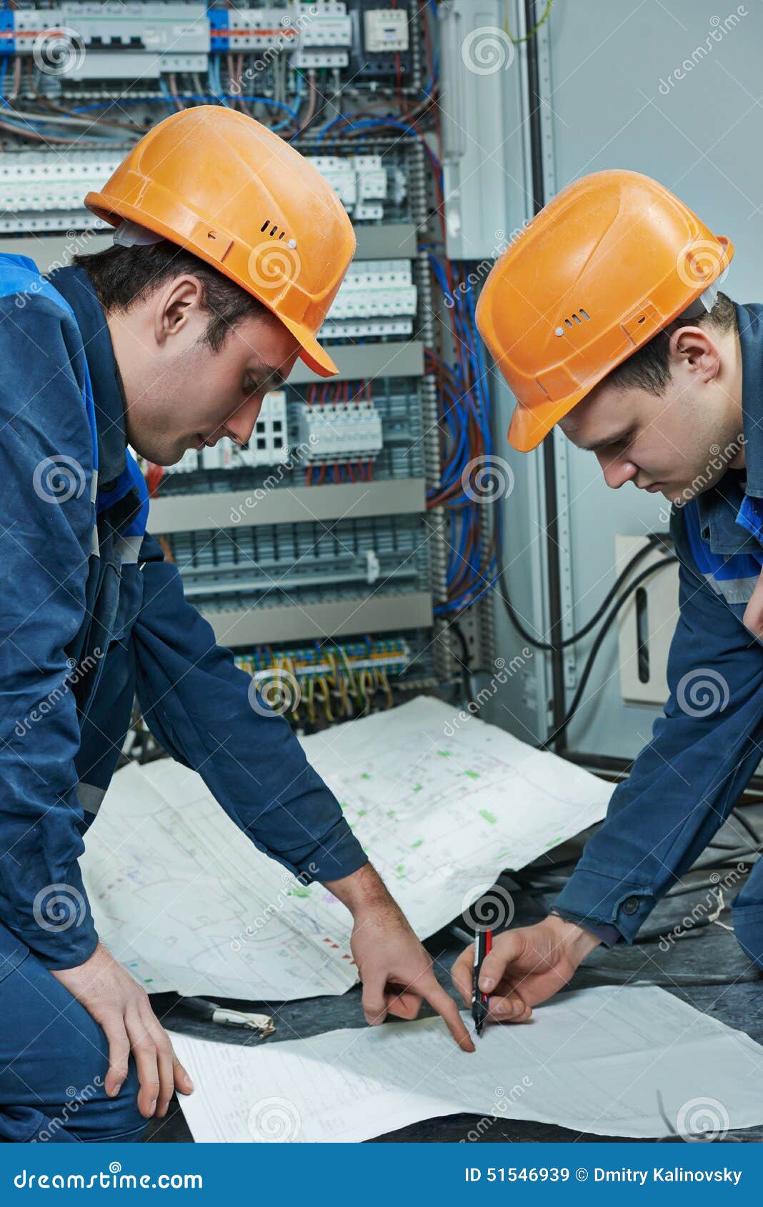 Two electrician workers stock image. Image of fuseboard - 51546939