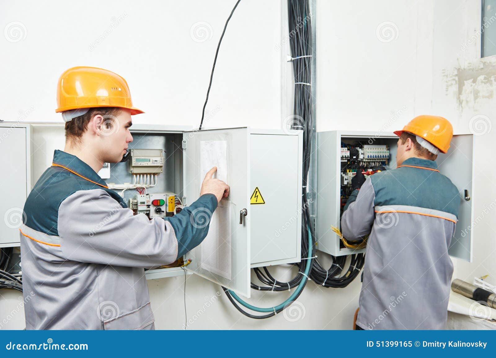 Two electrician workers stock image. Image of cabling - 51399165