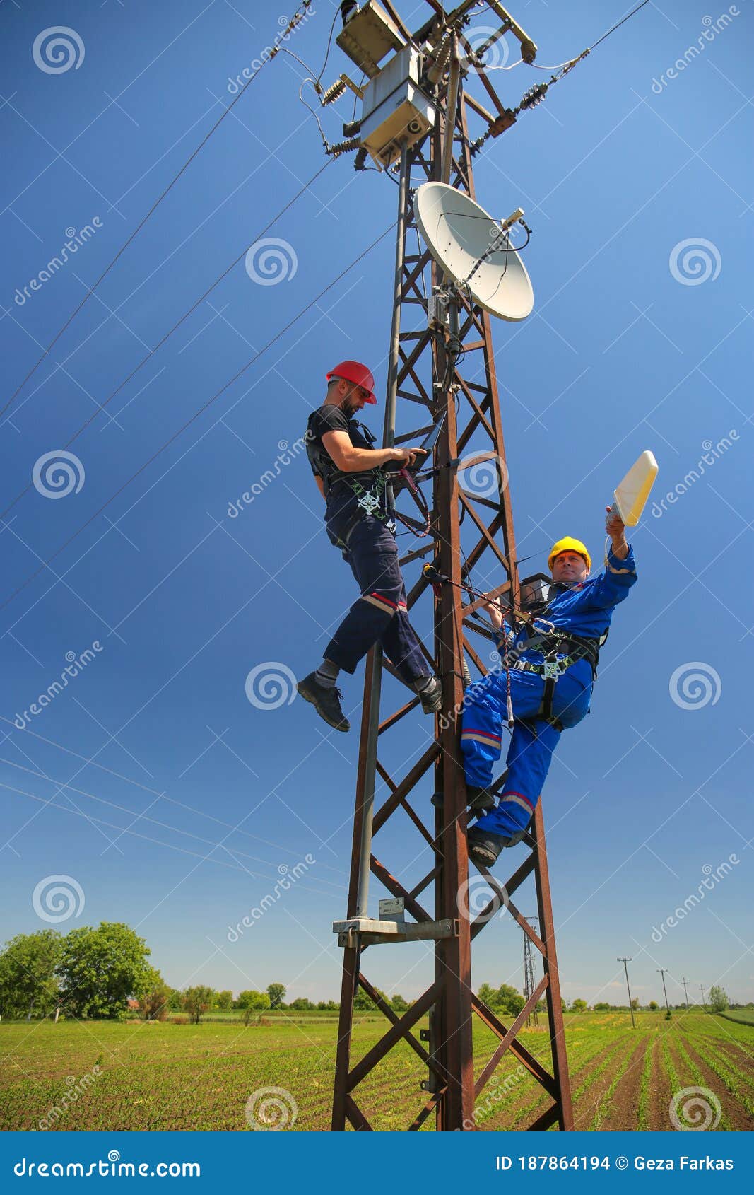 Two Electricians Install Telecommunications Antenna System Stock Photo ...