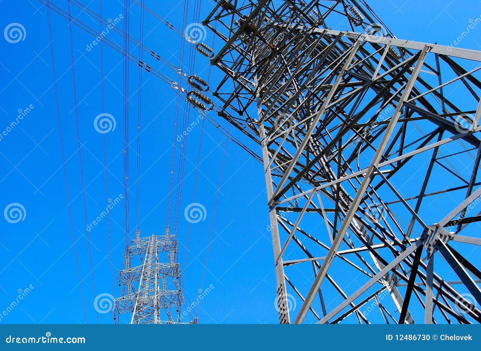 Two electricity pylons stock photo. Image of tall, line - 12486730