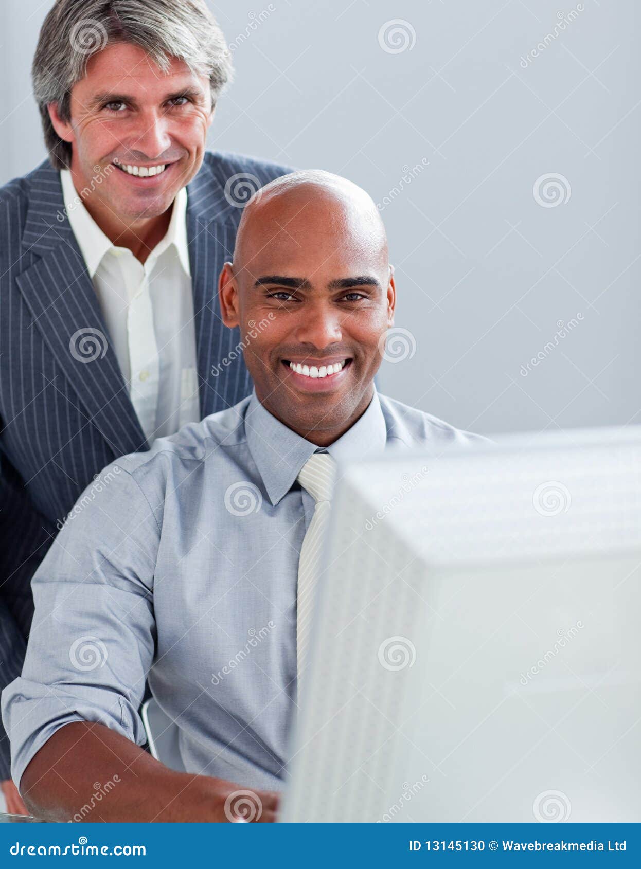 Two Elegant Businessmen Working at a Computer Stock Photo - Image of ...
