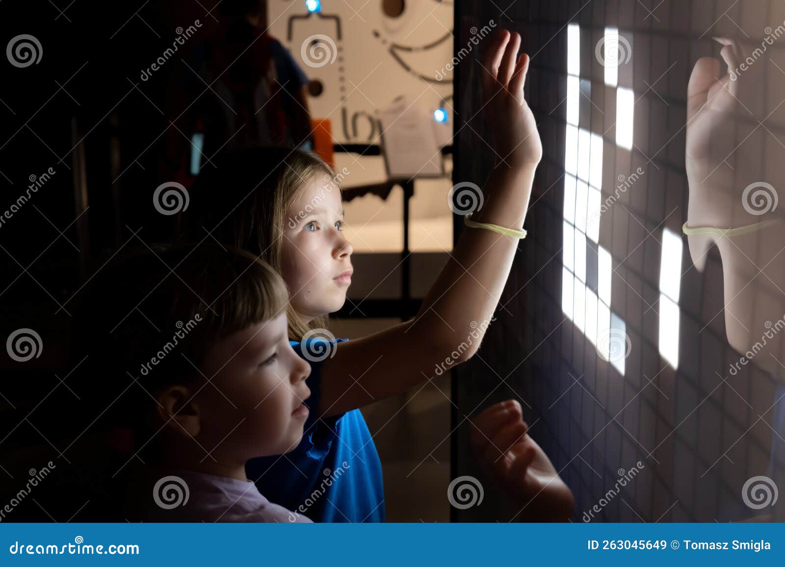 Two Elementary School Age Children, Girls Interacting with a ...
