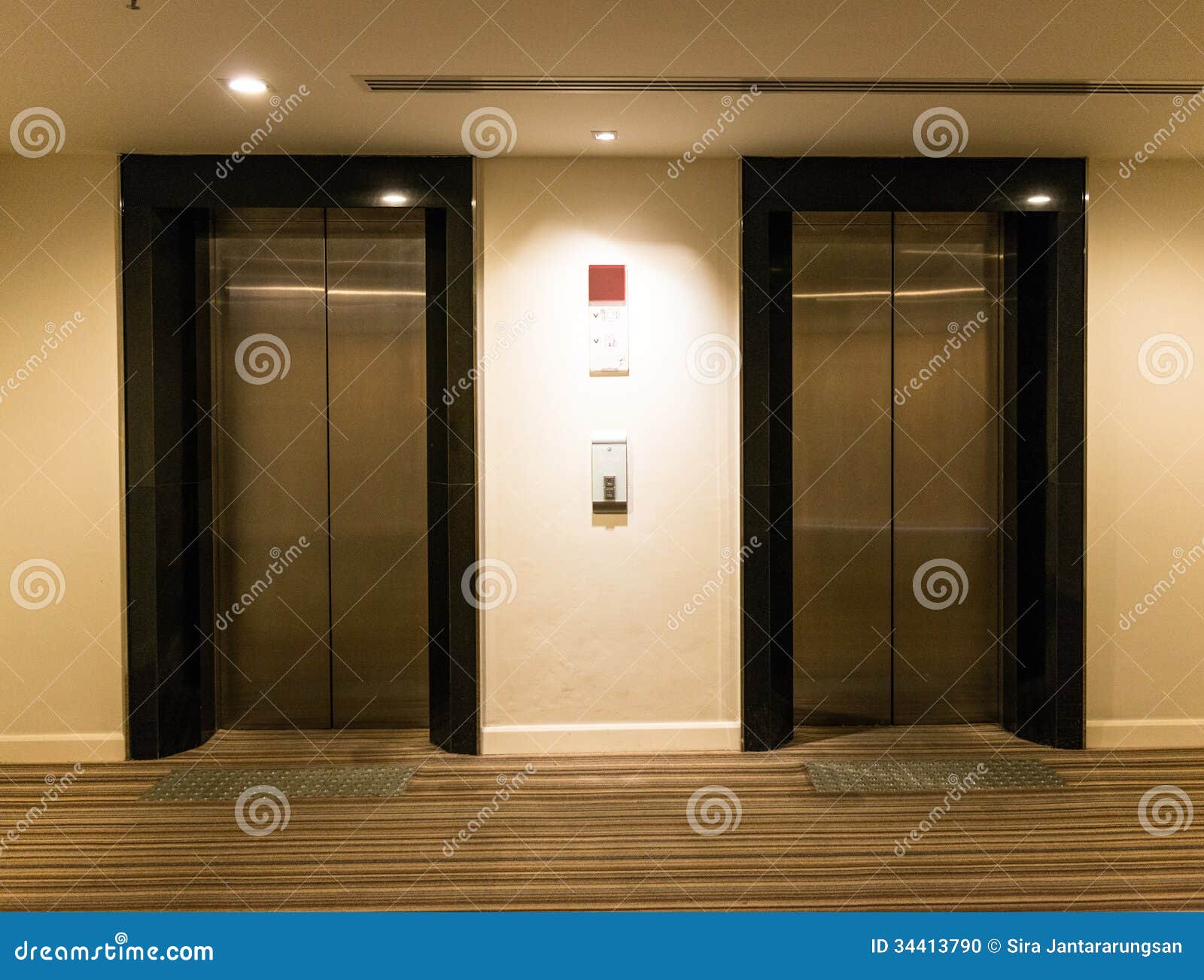 Two elevator doors stock photo. Image of indoors, metallic - 34413790