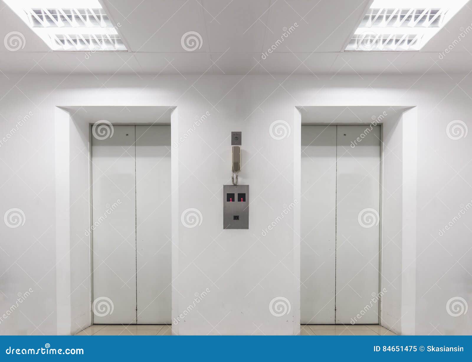 Two Elevators Inside White Building Stock Image - Image of wall, design ...