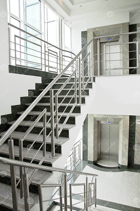 Two elevators and stairs stock image. Image of lift, elevators - 19516733